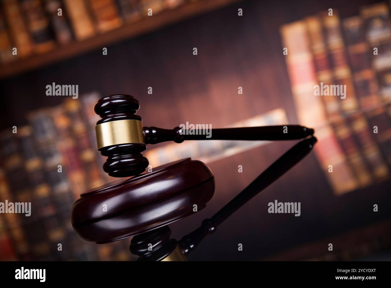 Law books, mallet of the judge, Courtroom background Stock Photo - Alamy