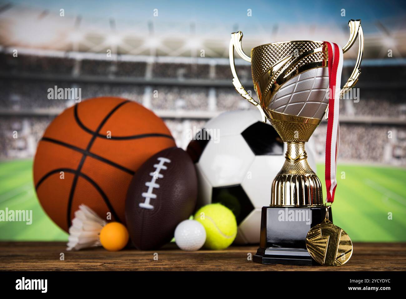 Winner trophy, Sport equipment and balls Stock Photo - Alamy