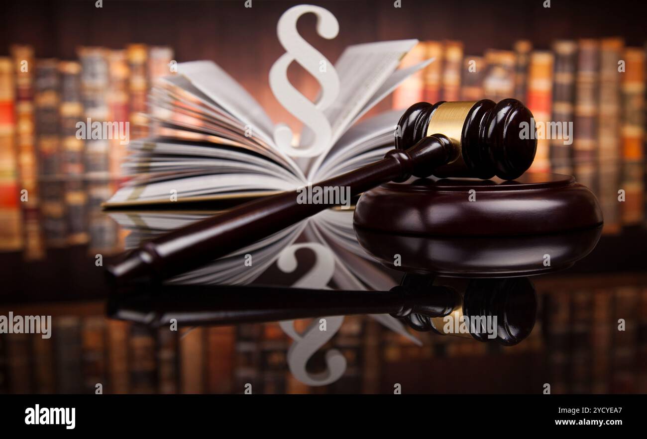 law theme, mallet of the judge, justice scale, books, wooden desk Stock Photo - Alamy