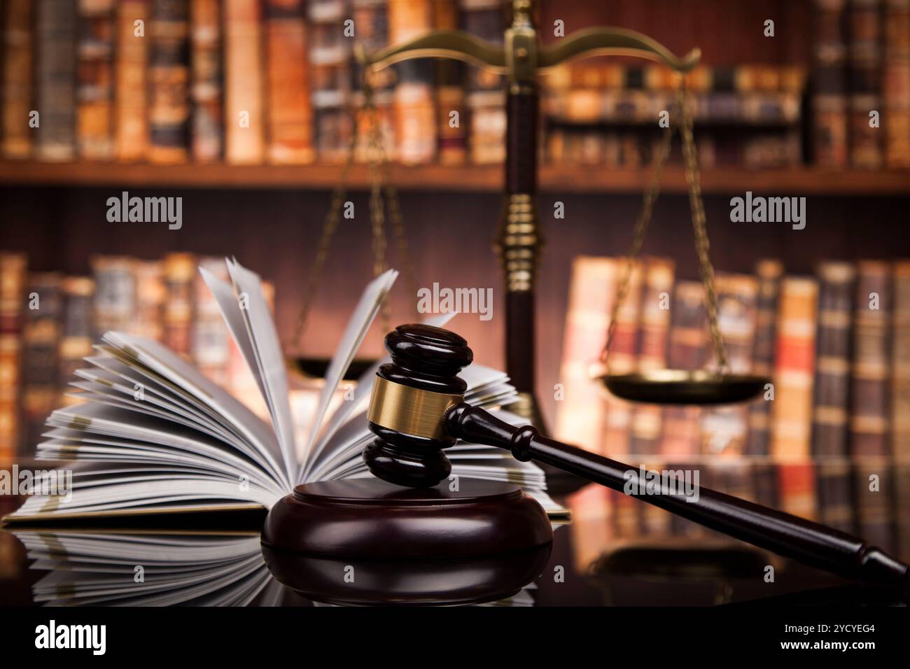 Law books, mallet of the judge, Courtroom background Stock Photo - Alamy