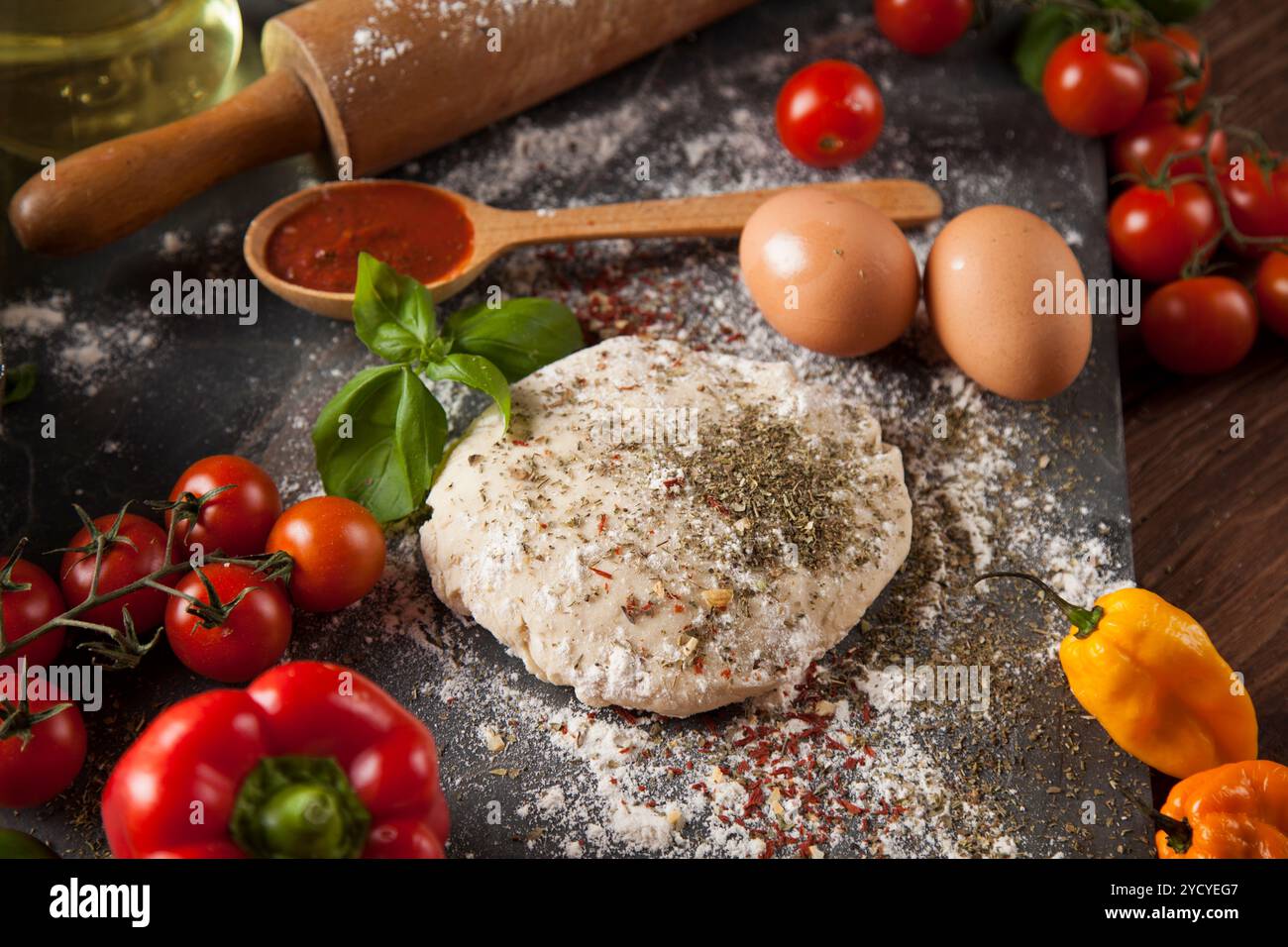 Homemade Italian pizza preparation Stock Photo - Alamy