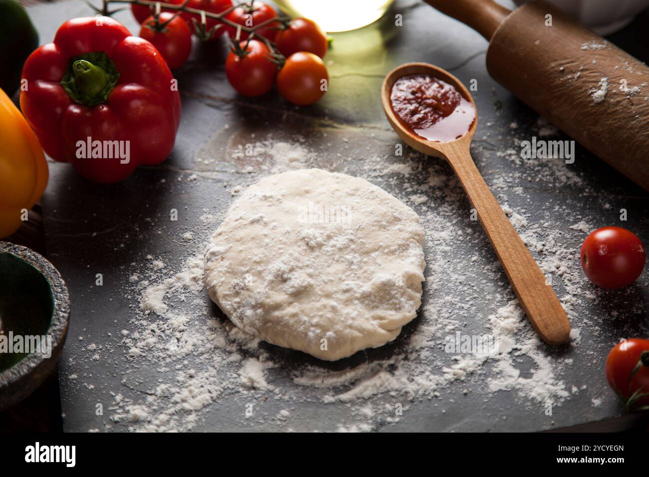 Fresh an tasty homemade pizza preparation Stock Photo - Alamy