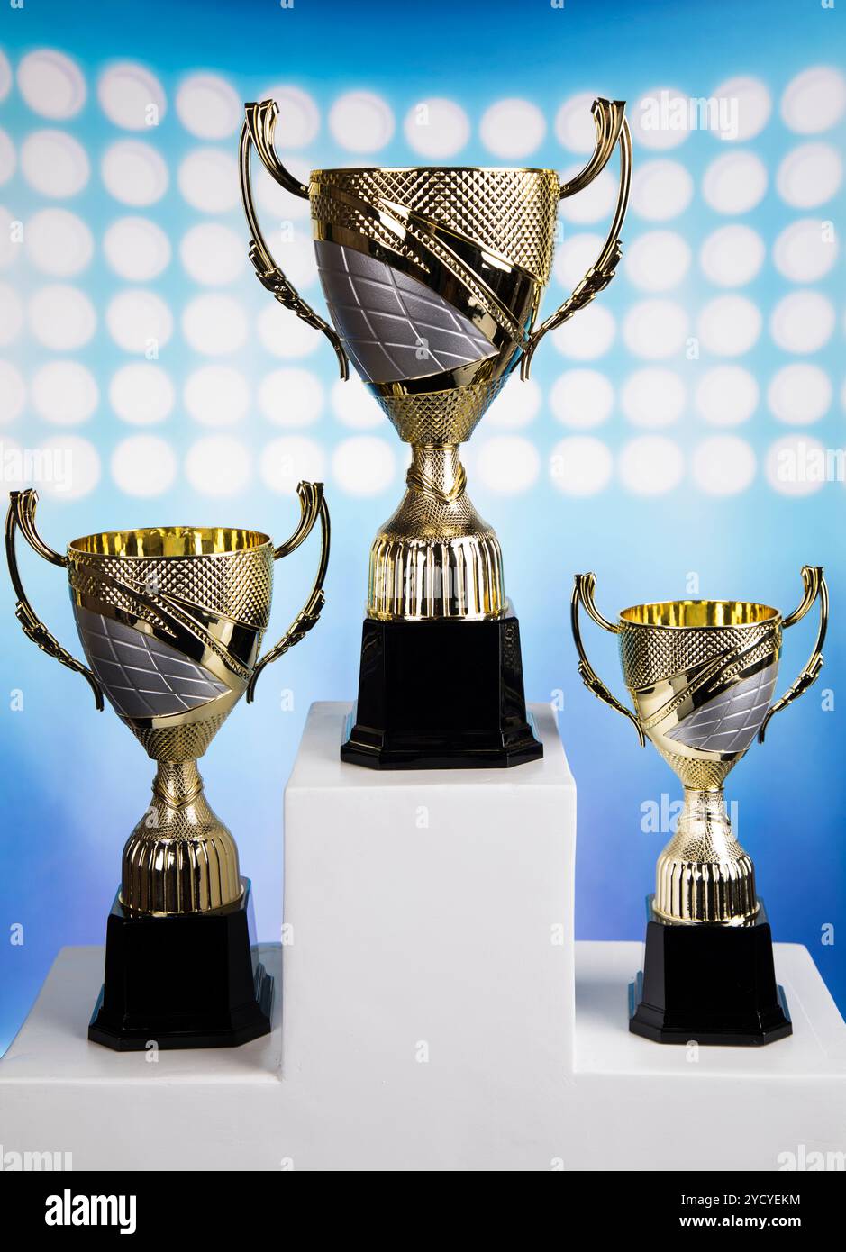 Sport podium, Cups of winners award Stock Photo - Alamy