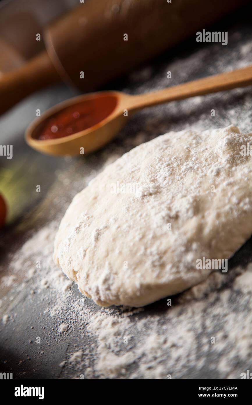 Homemade Italian pizza preparation Stock Photo - Alamy