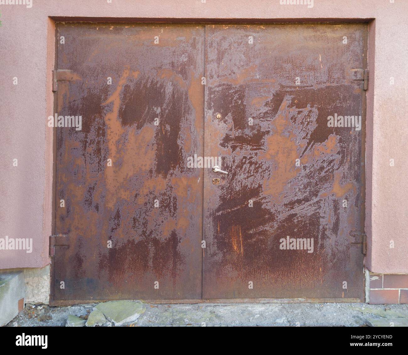 Rusted metal door with weathered texture Stock Photo - Alamy
