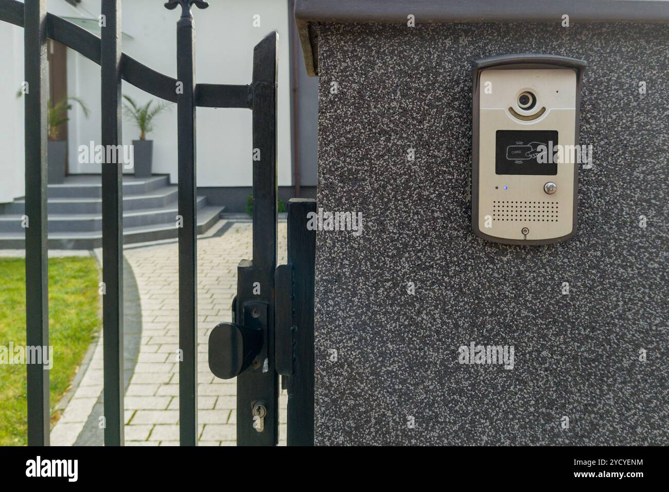 Metal Gate with Card Access Intercom and Key Lock Stock Photo - Alamy