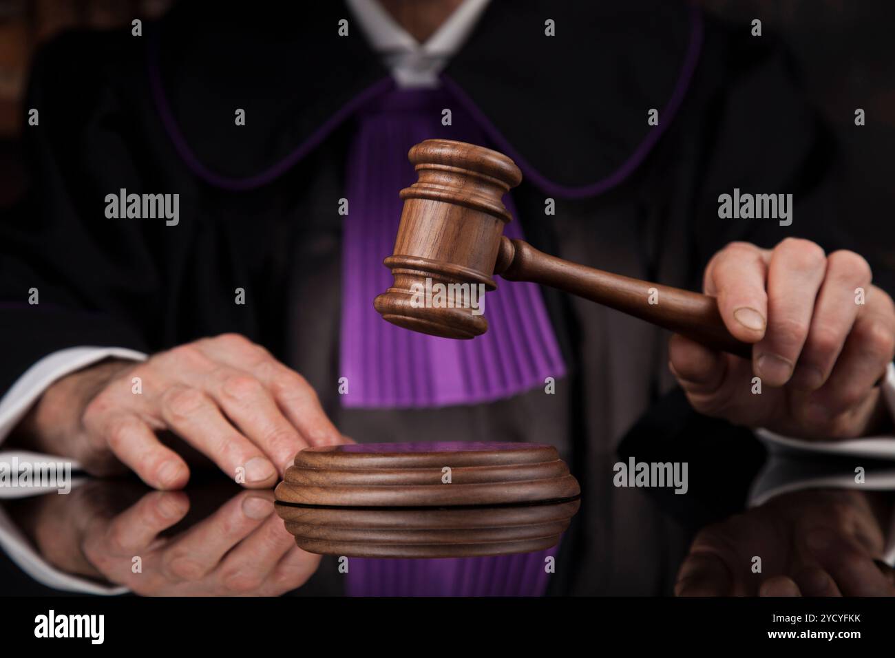 Judge, male judge in a courtroom striking the gavel Stock Photo - Alamy