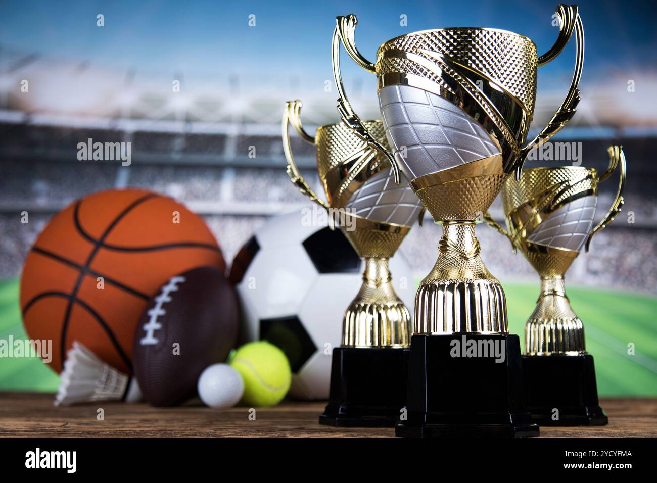 Winner trophy, Sport equipment and balls Stock Photo - Alamy