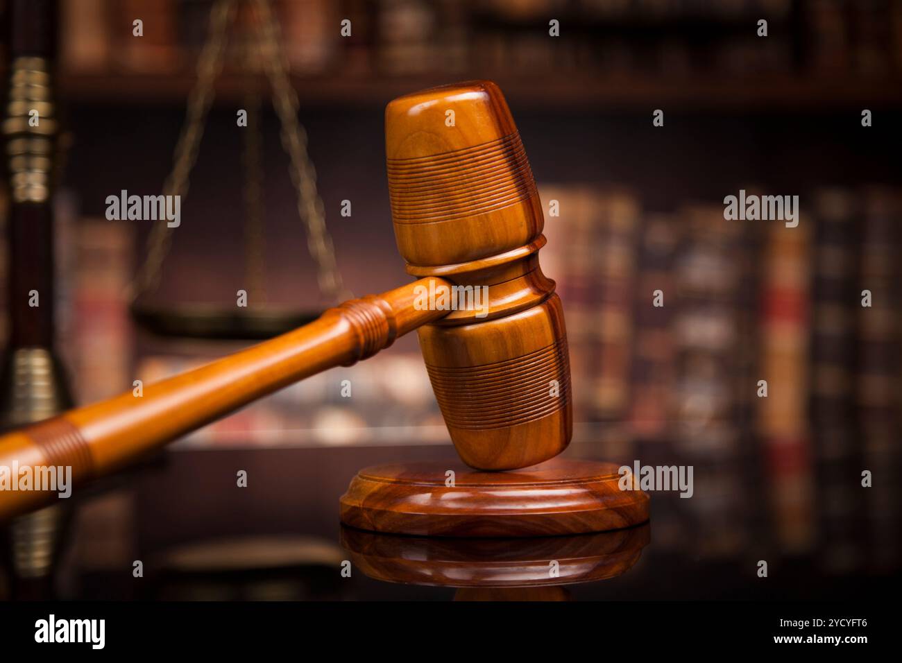 Law books, mallet of the judge, Courtroom background Stock Photo - Alamy
