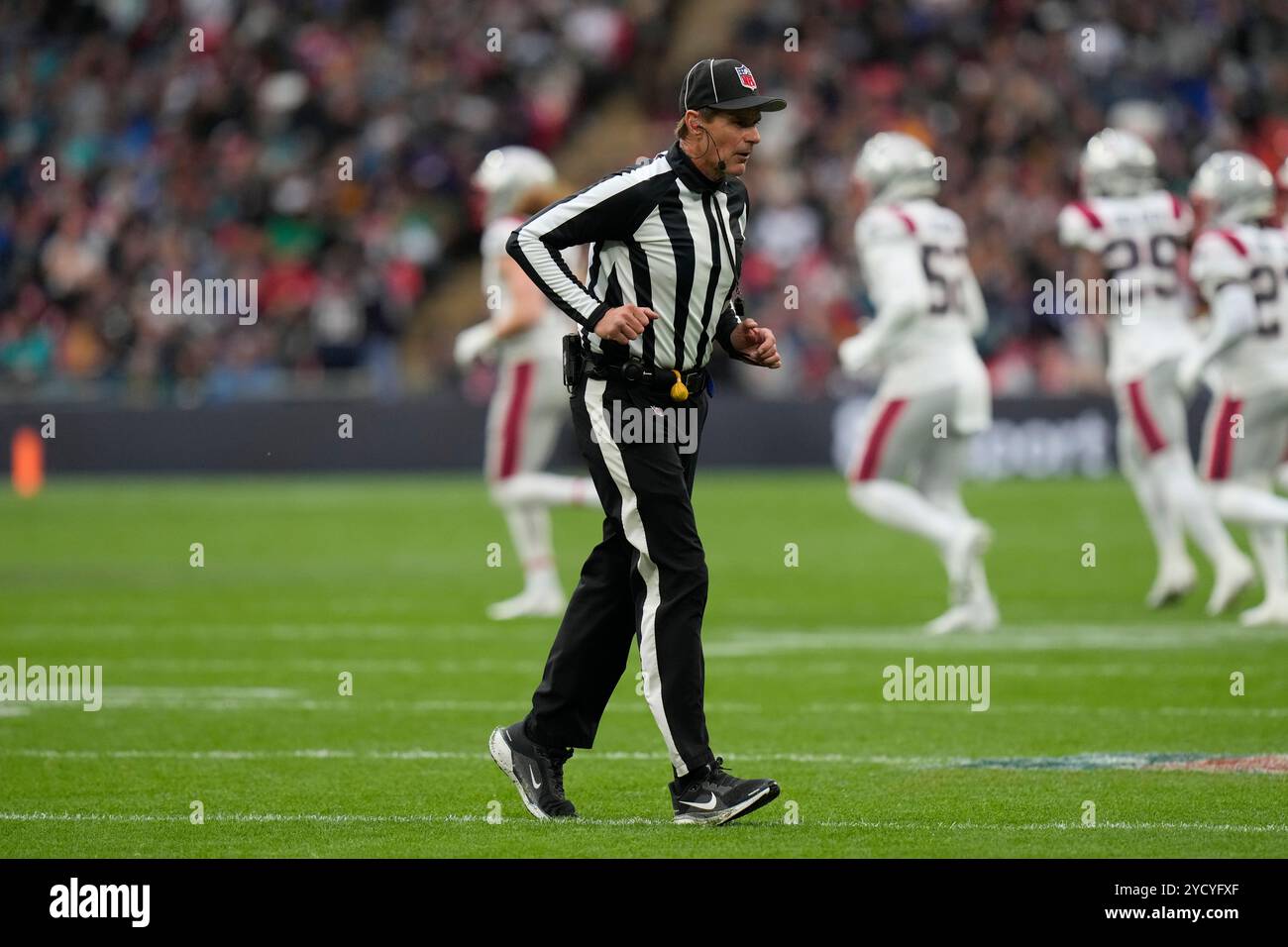 Down judge Kent Payne works during an NFL football game between the ...
