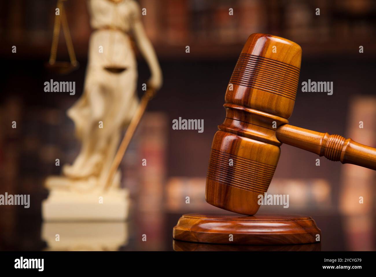 Antique statue of justice, law, books background Stock Photo - Alamy