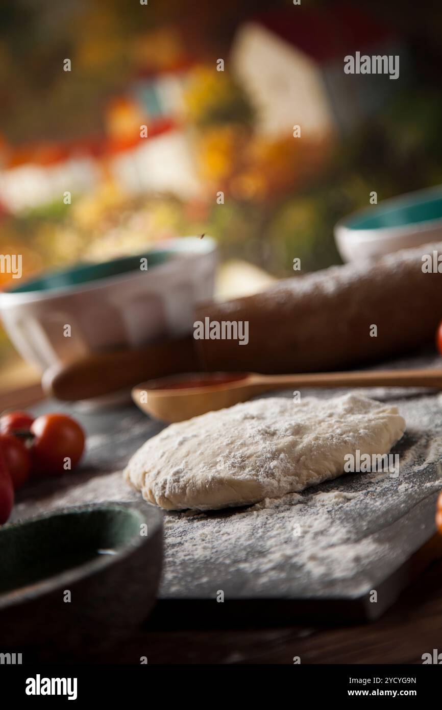 Homemade Italian pizza preparation Stock Photo - Alamy