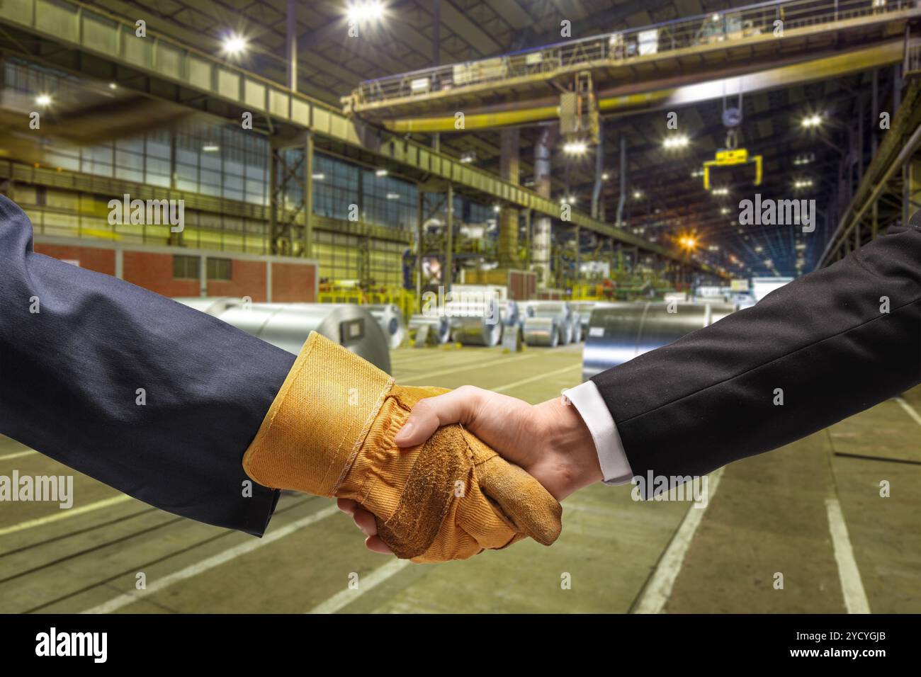 Business shaking hands factory hi-res stock photography and images - Alamy