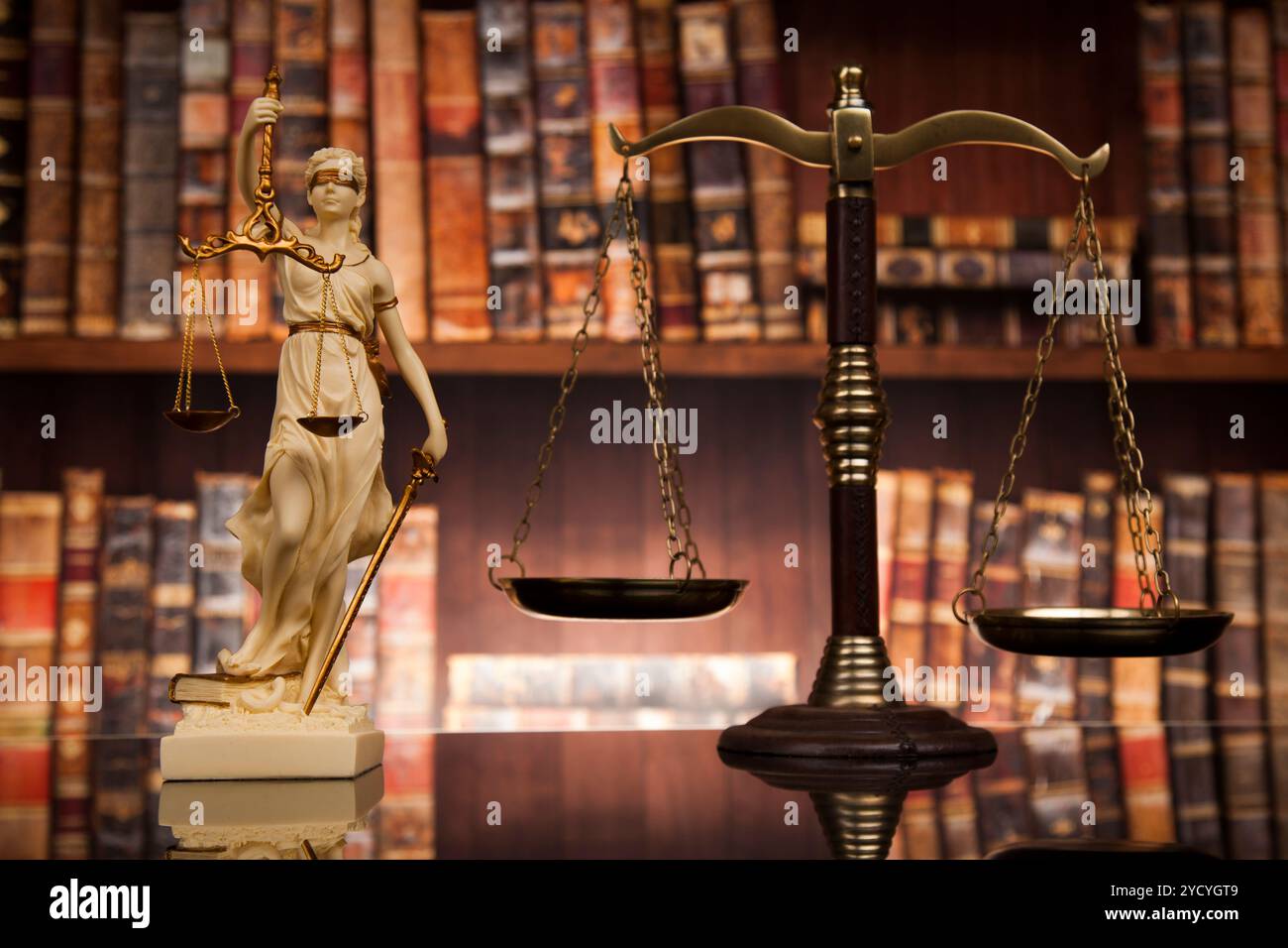 Antique statue of justice, law, books background Stock Photo - Alamy