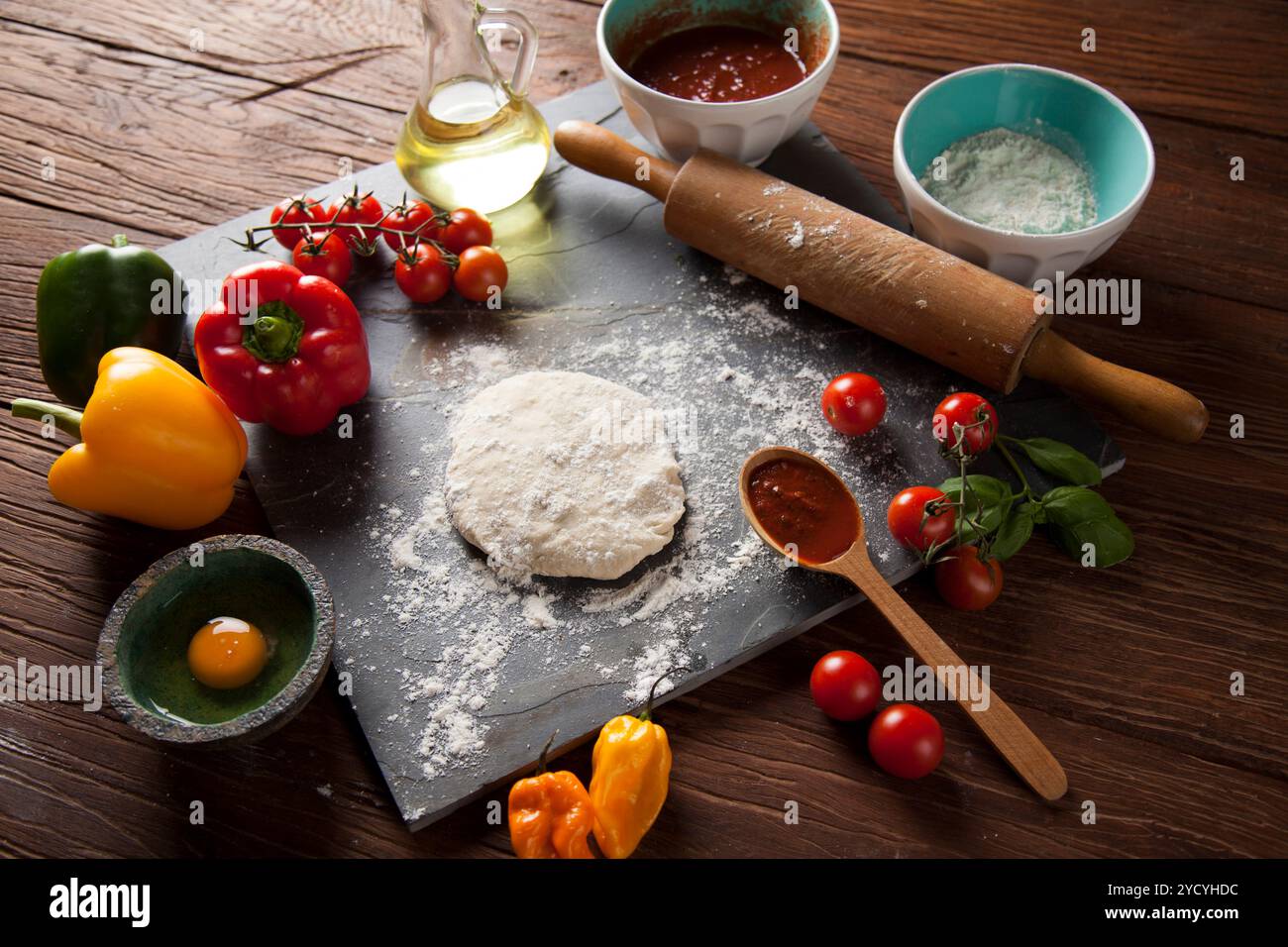 Homemade Italian pizza preparation Stock Photo - Alamy