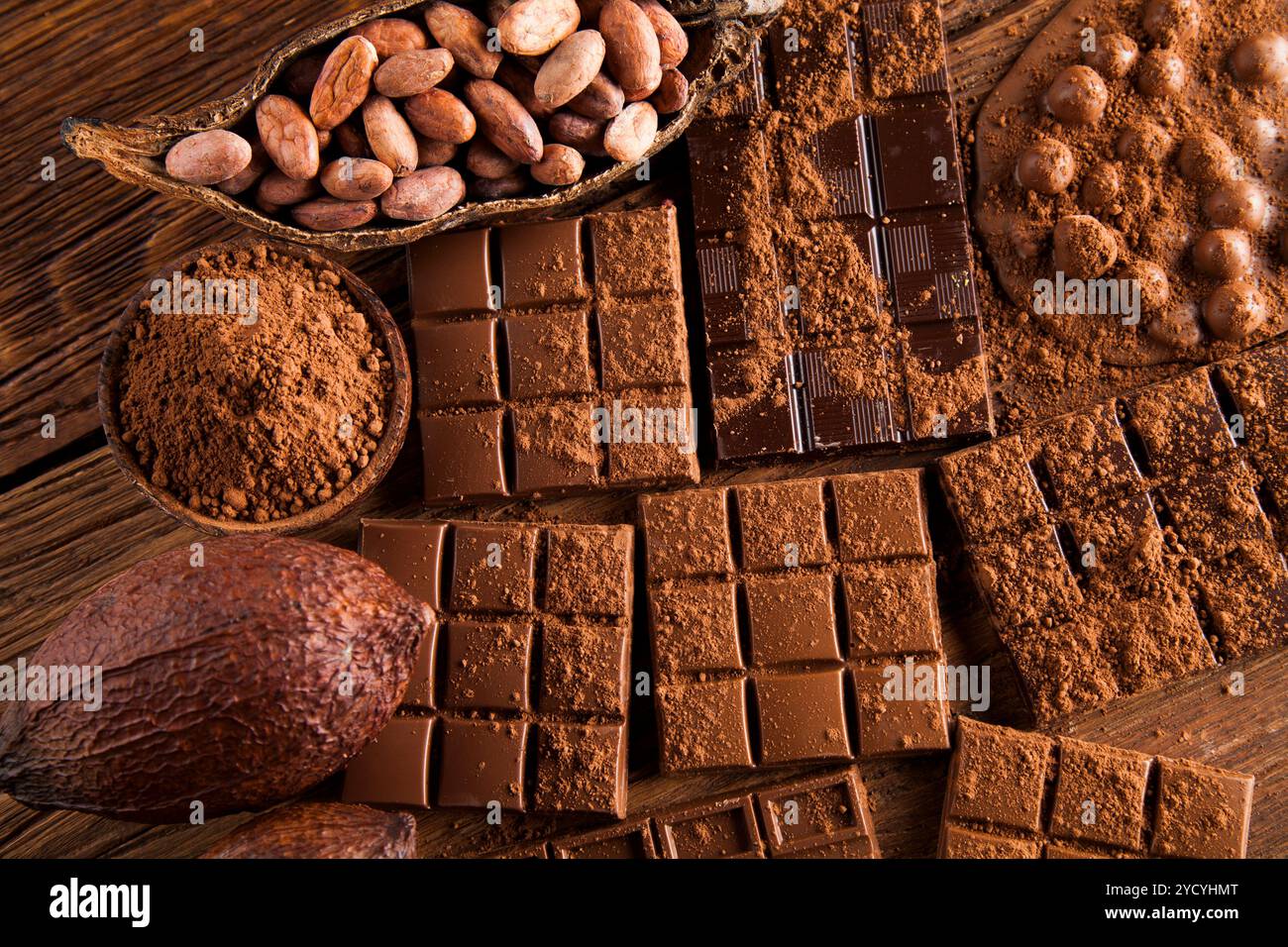 Dark homemade chocolate bars and cocoa pod on wooden Stock Photo - Alamy