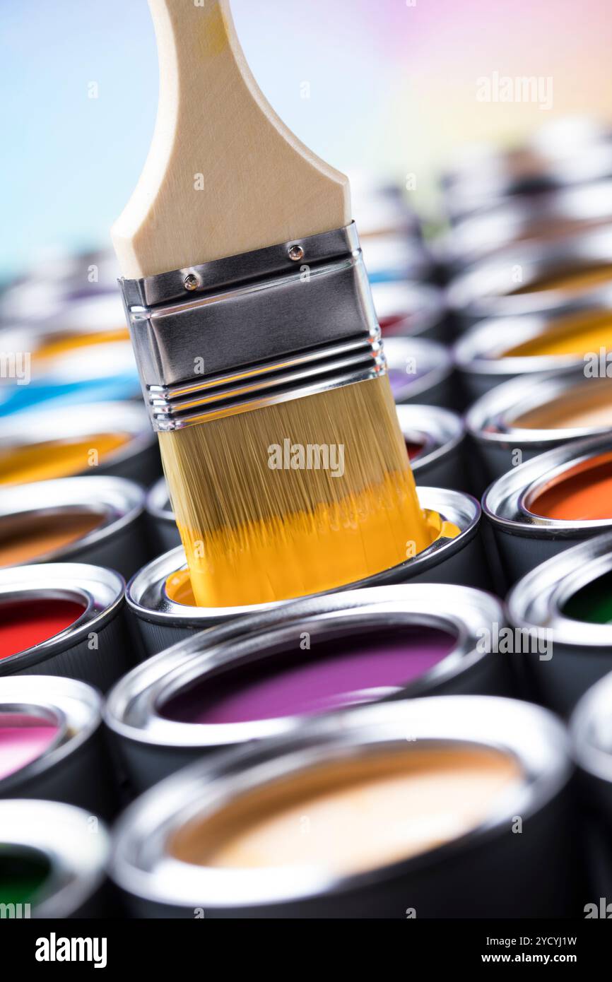 Open paint cans with a brush, Rainbow colors Stock Photo - Alamy