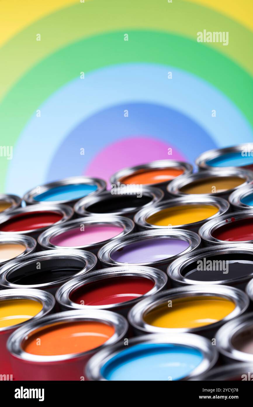 Rainbow colors, Group of tin metal cans Stock Photo - Alamy