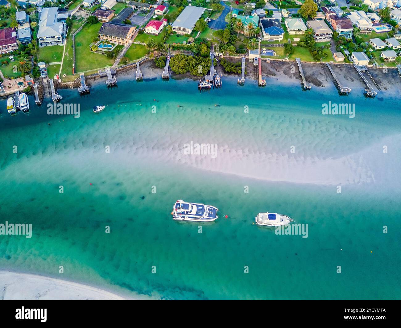 Boats in the shallow channel Stock Photo - Alamy