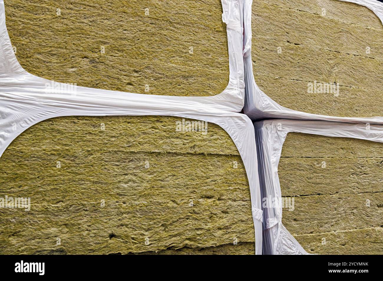stack of glass wool insulation stacks in whie shrink wrap Stock Photo ...