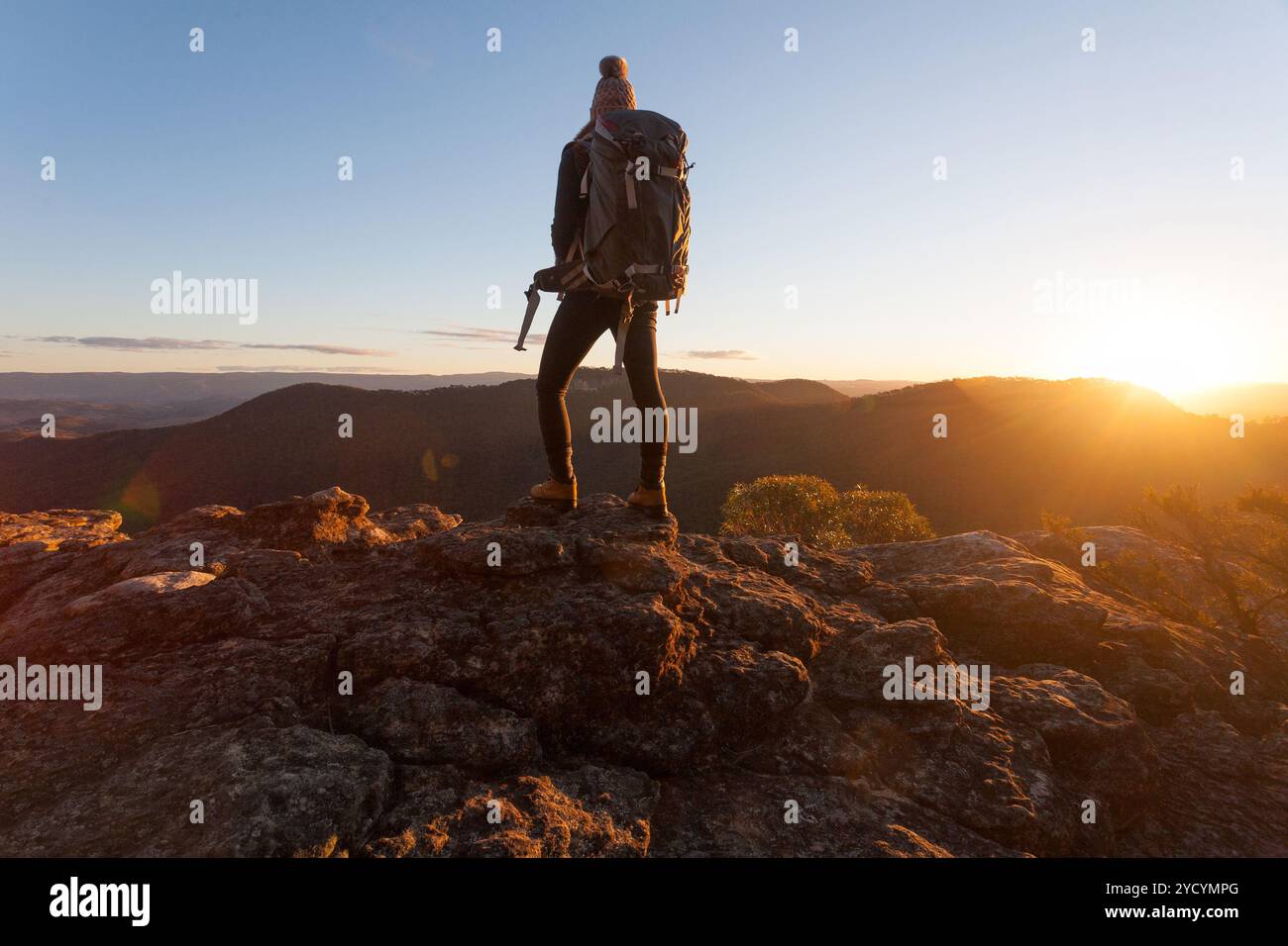 Female standing edge peak hi-res stock photography and images - Alamy