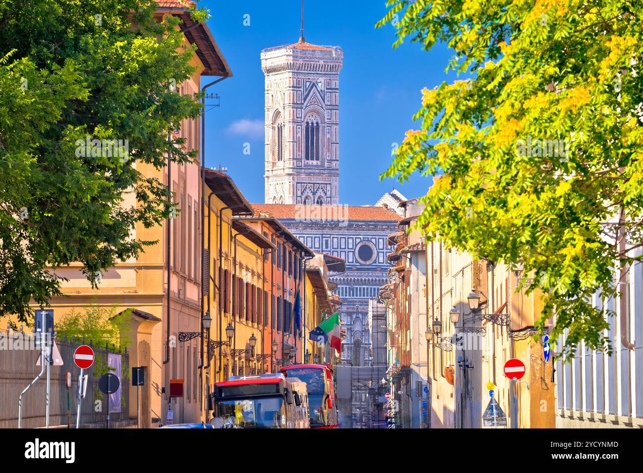 Colorful street of Florence and Giotto bell tower of Duomo view Stock ...