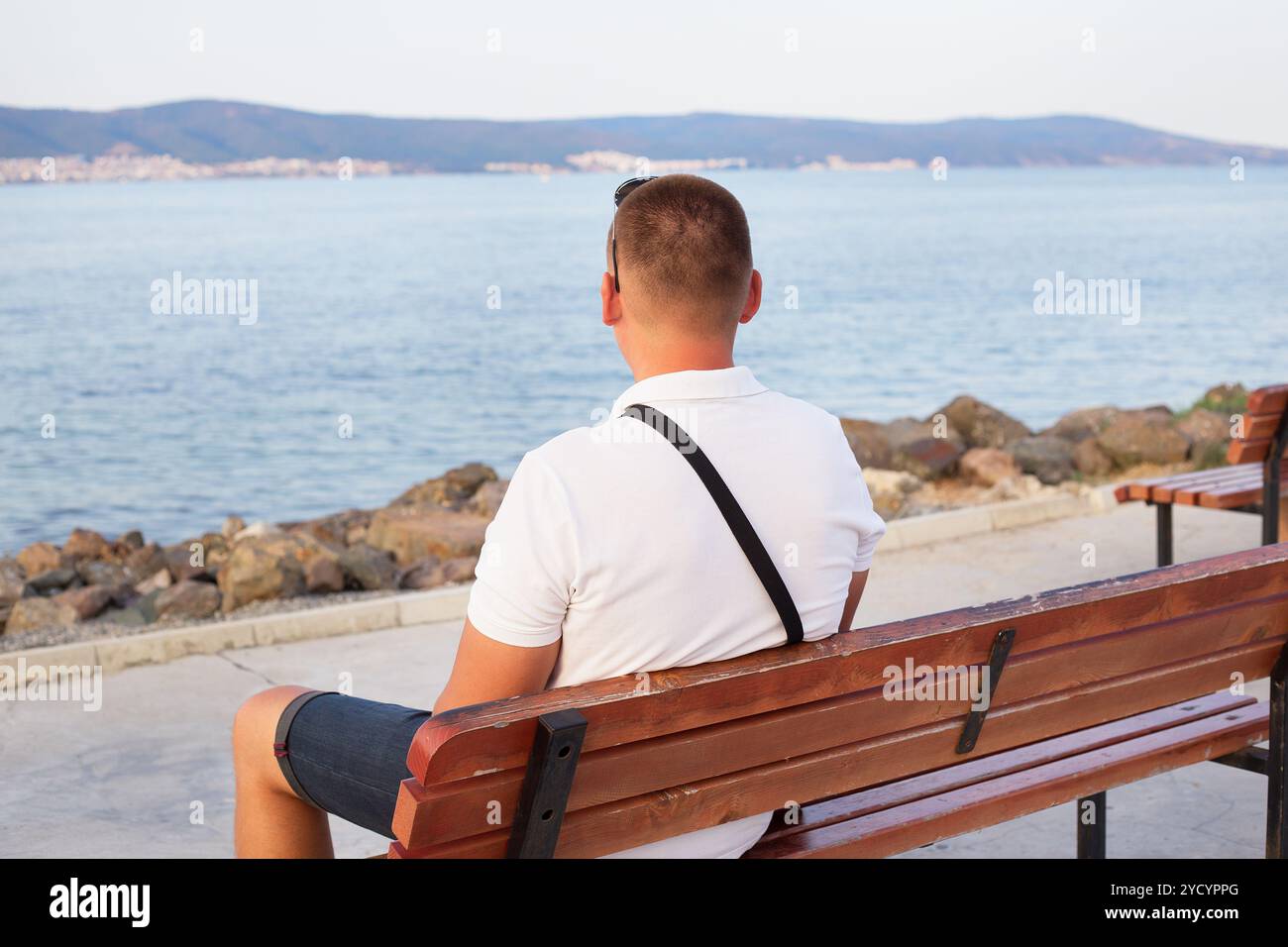 Guy on a bench hi-res stock photography and images - Alamy