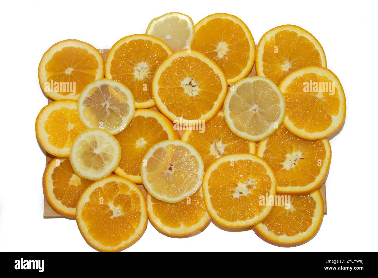 Sliced ripe orange on wooden Cut Out Stock Images & Pictures - Alamy