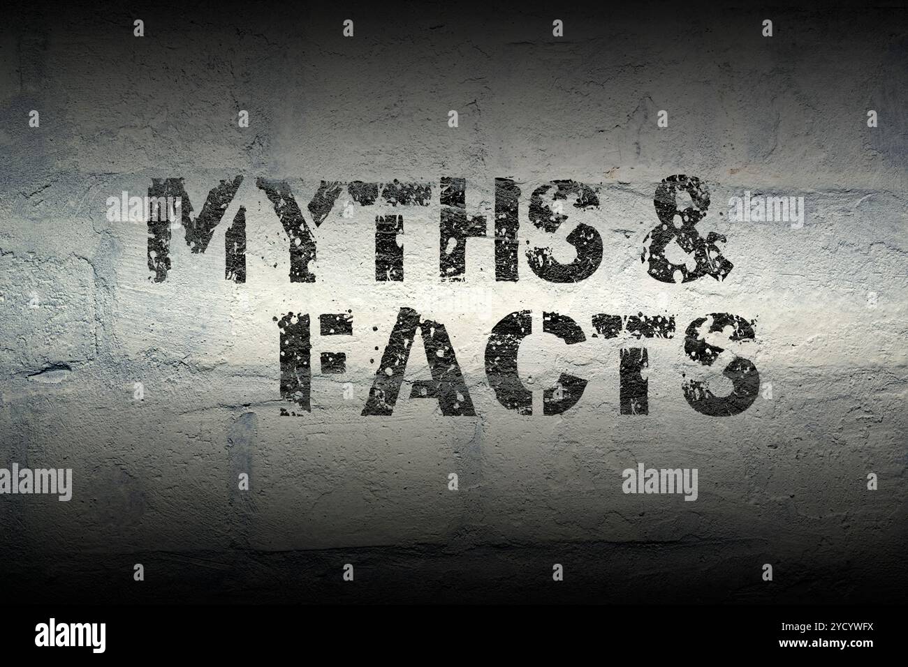 myths and facts stencil print on the grunge white brick wall Stock ...