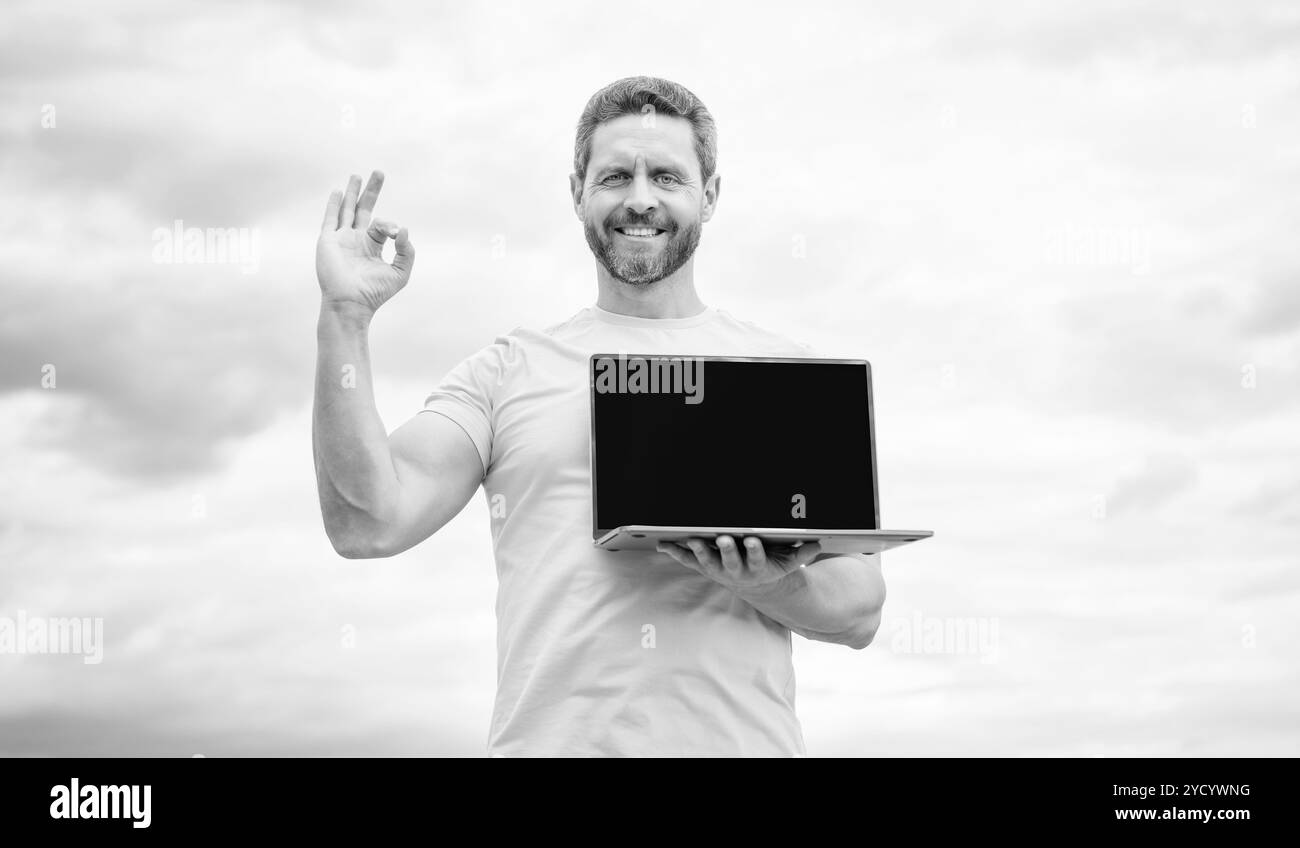 Man presenting computer on Black and White Stock Photos & Images - Alamy