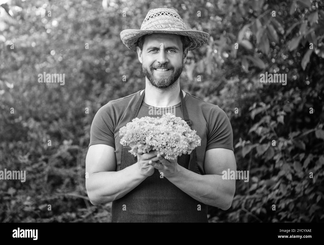 Happy farmer in straw Black and White Stock Photos & Images - Alamy