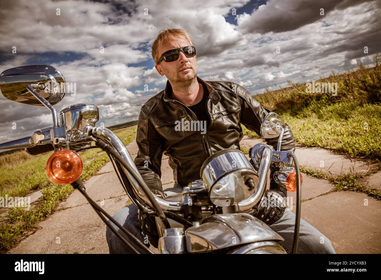 Biker on a motorcycle Stock Photo - Alamy