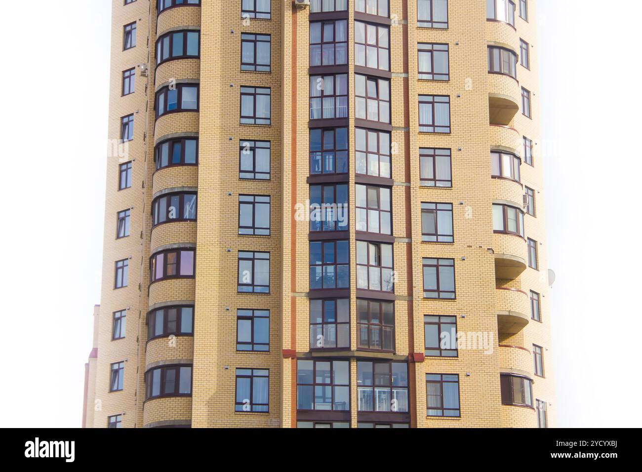 The windows of a high-rise multi-storey residential building. Buildings and architecture. Multi ...