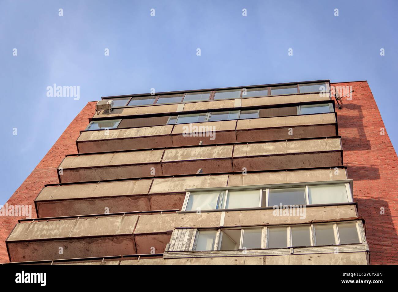 The windows of a high-rise multi-storey residential building. Buildings ...
