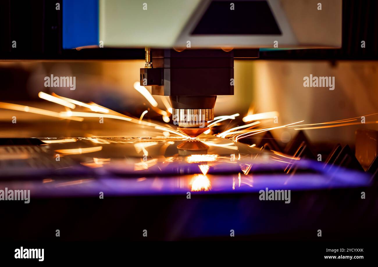 CNC Laser cutting of metal, modern industrial technology. Small depth ...