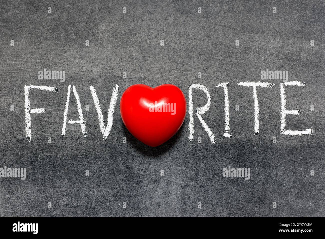 favorite word handwritten on blackboard with heart symbol instead of O ...