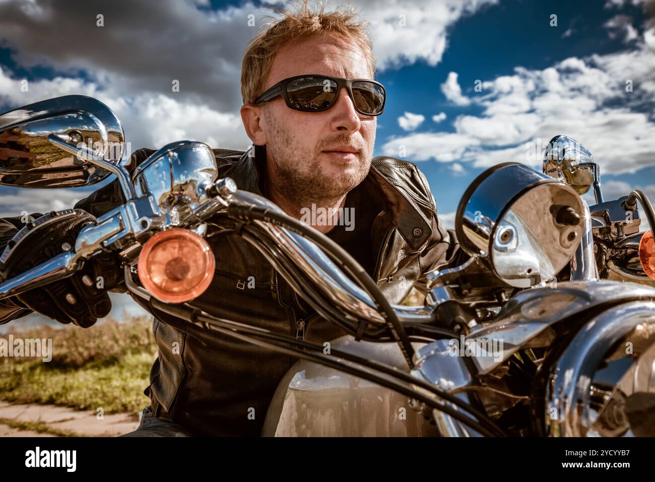 Biker on a motorcycle Stock Photo - Alamy
