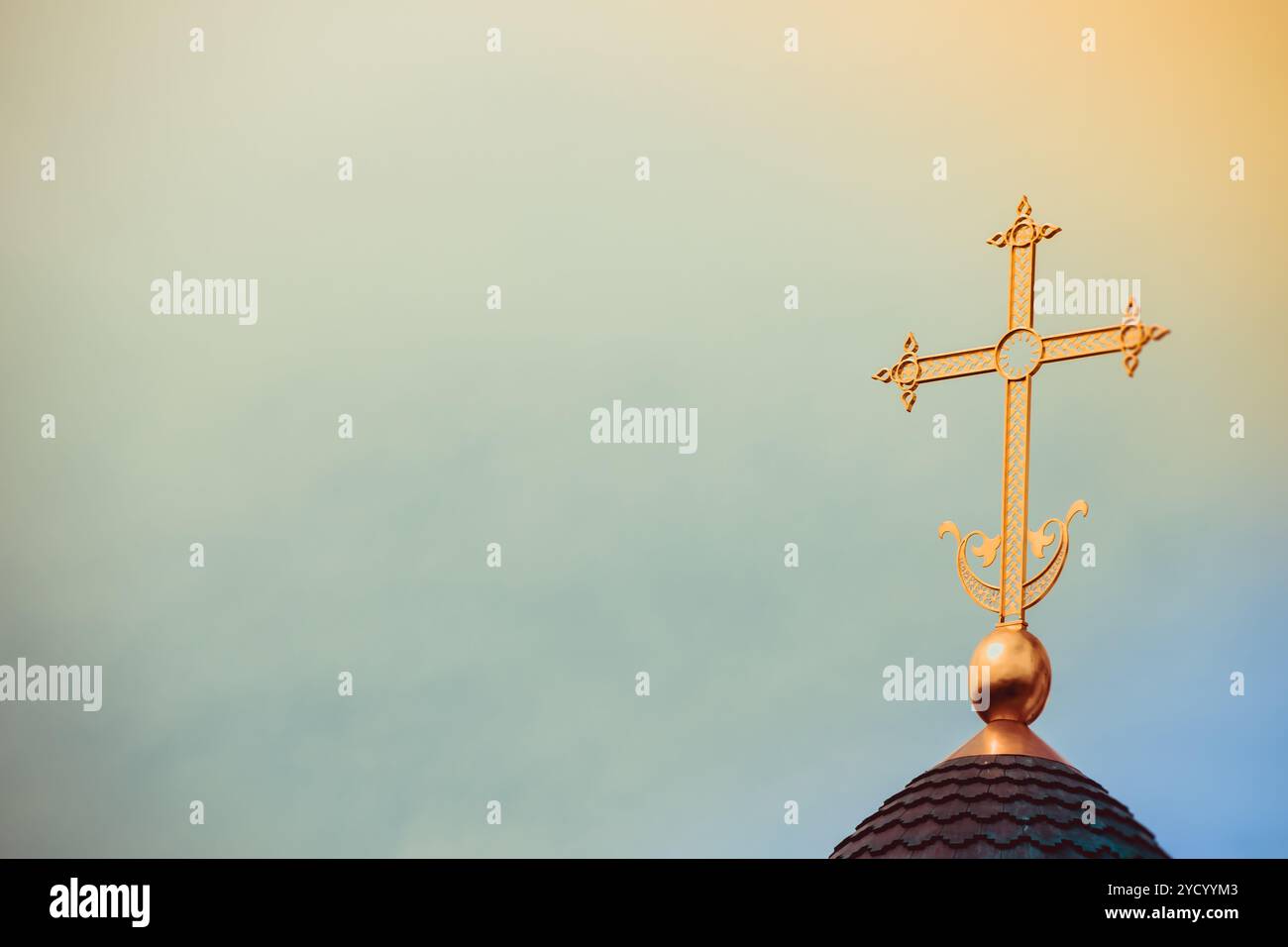 Golden cross on the dome of the temple. Gold cross on a blue sky Stock ...