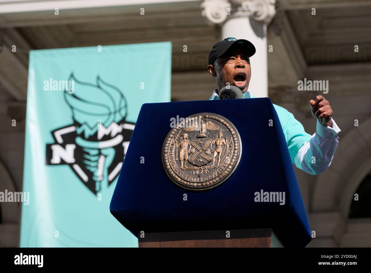 New York mayor Eric Adams speaks during a ceremony after a parade in ...