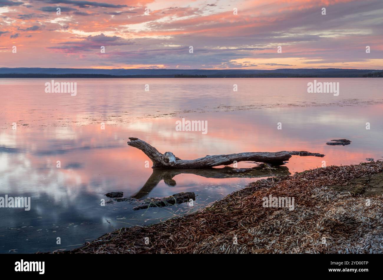 Sunset over the coastal inlet of St Georges Basin Stock Photo - Alamy
