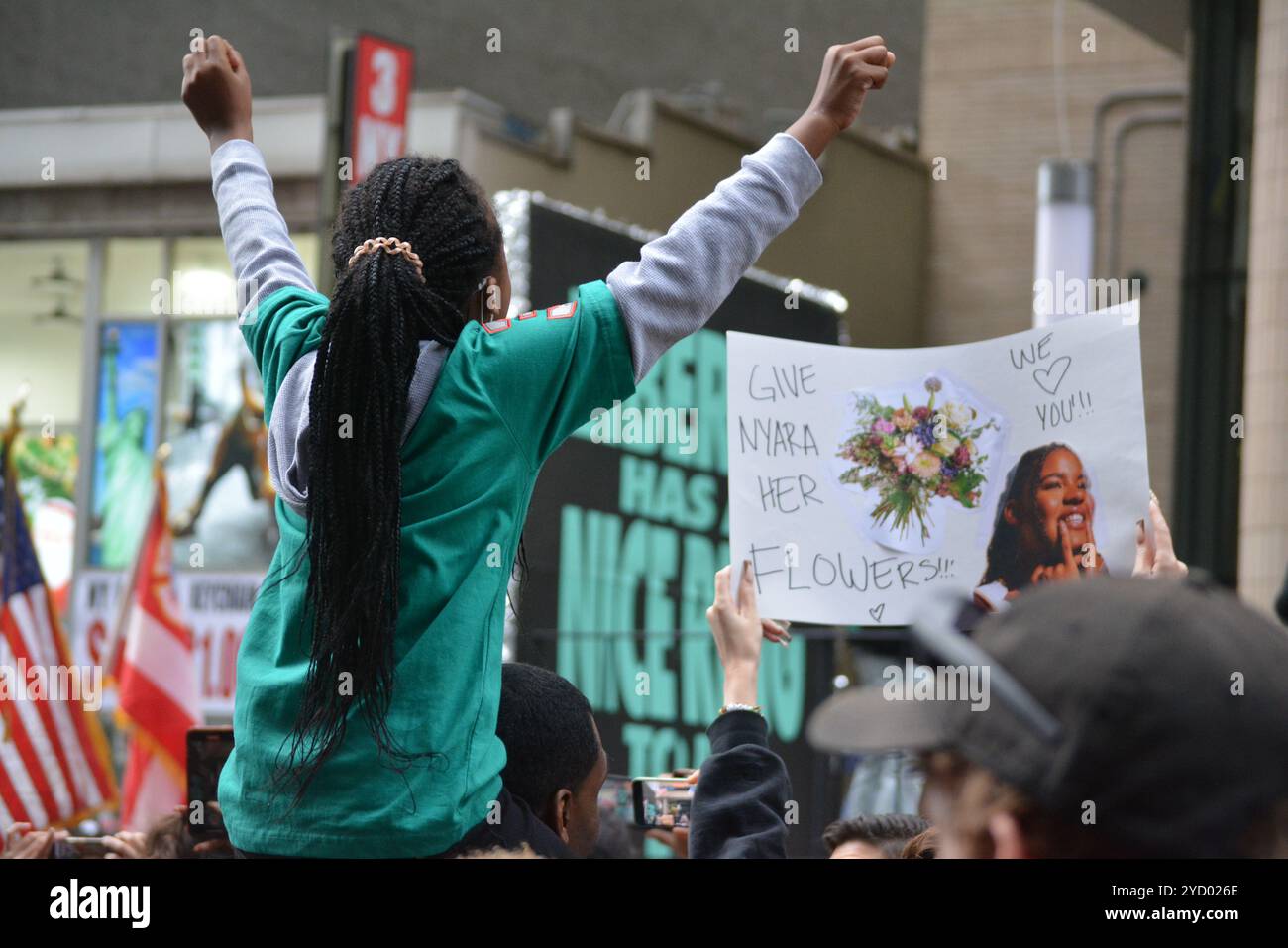 Fans celebrating the New York Liberty at the parade celebrating the ...