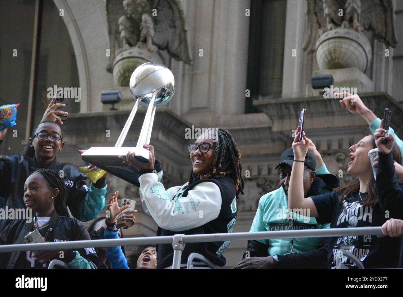 New York Liberty C.E.O. Keia Clarke holding the WNBA Championship ...