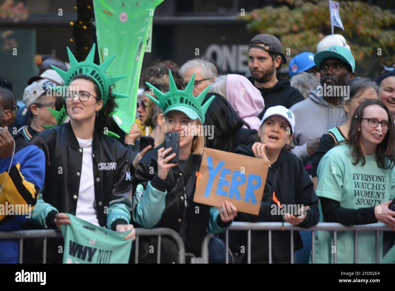 Fans celebrating the WNBA Champion New York Liberty at a victory parade ...