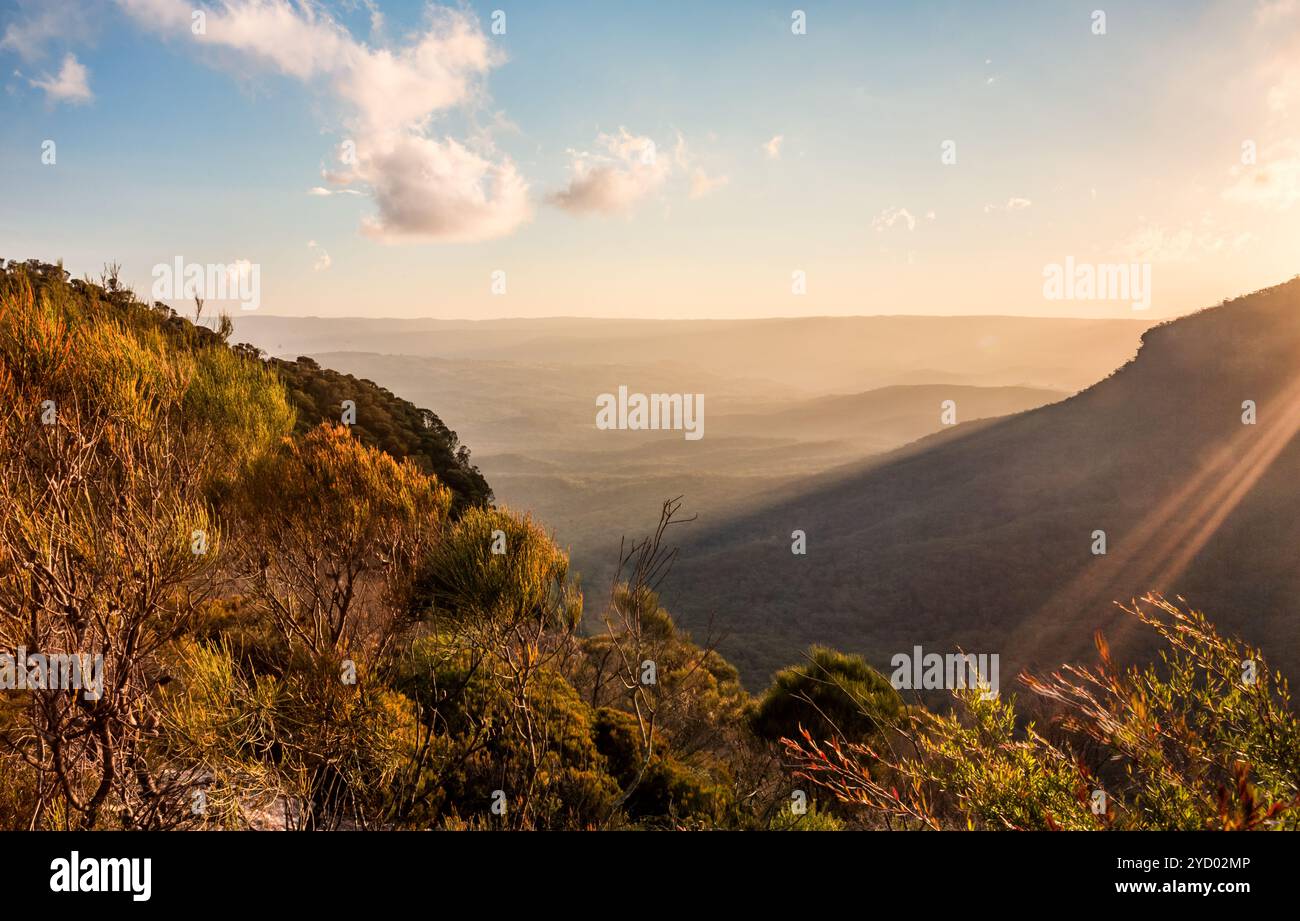 Views from the mountain escarpment into the valley in late afternoon ...