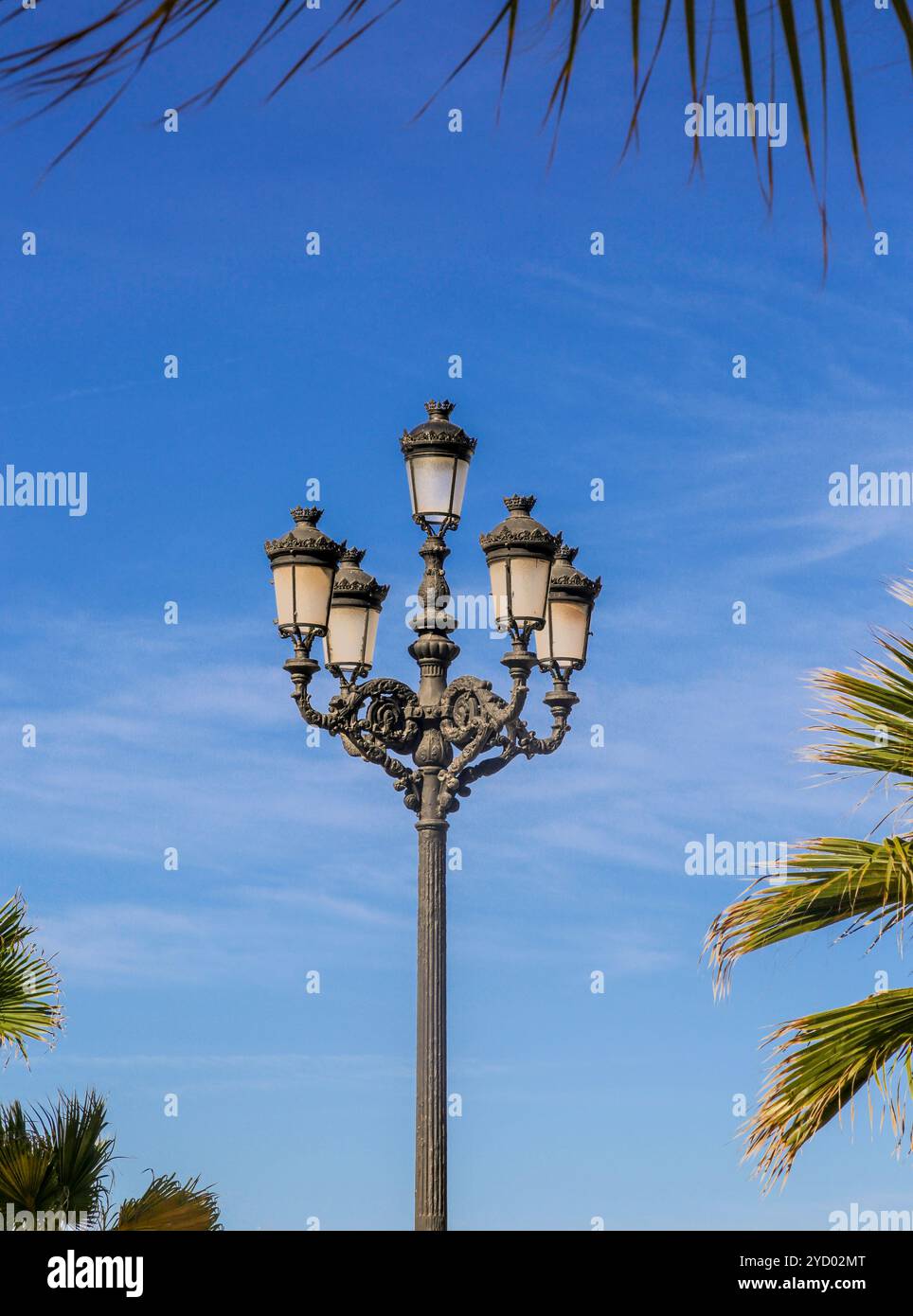 Cast iron street lights in the Spanish city of Cadiz Stock Photo - Alamy