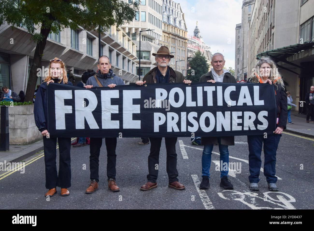 London, UK. 24th Oct, 2024. Protesters hold a 'Free political prisoners ...
