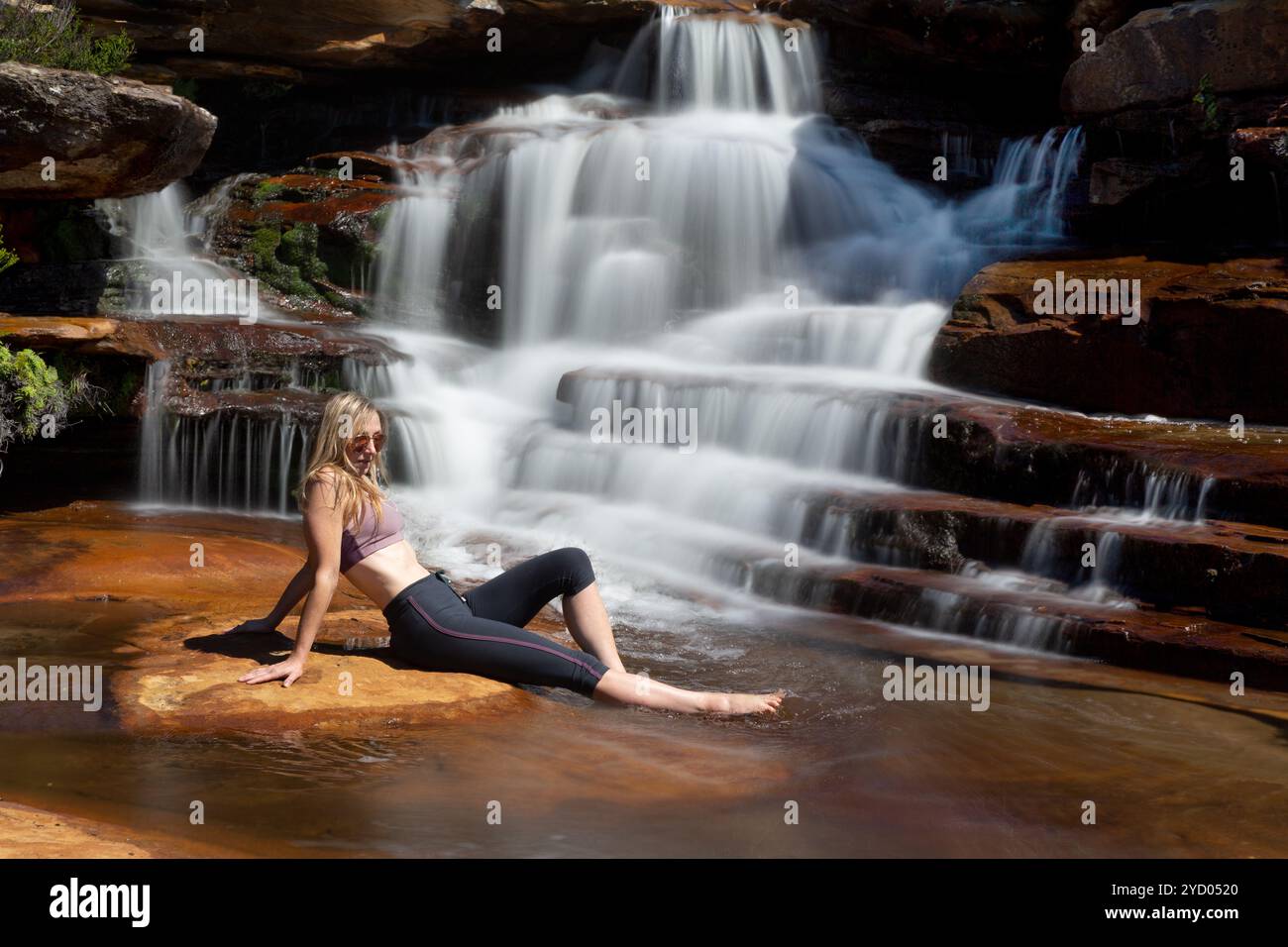 Woman relaxing under outdoor hi-res stock photography and images - Alamy
