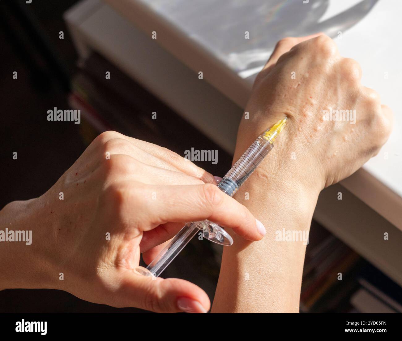 Woman performing mesotherapy, bio revitalization procedure, injecting ...