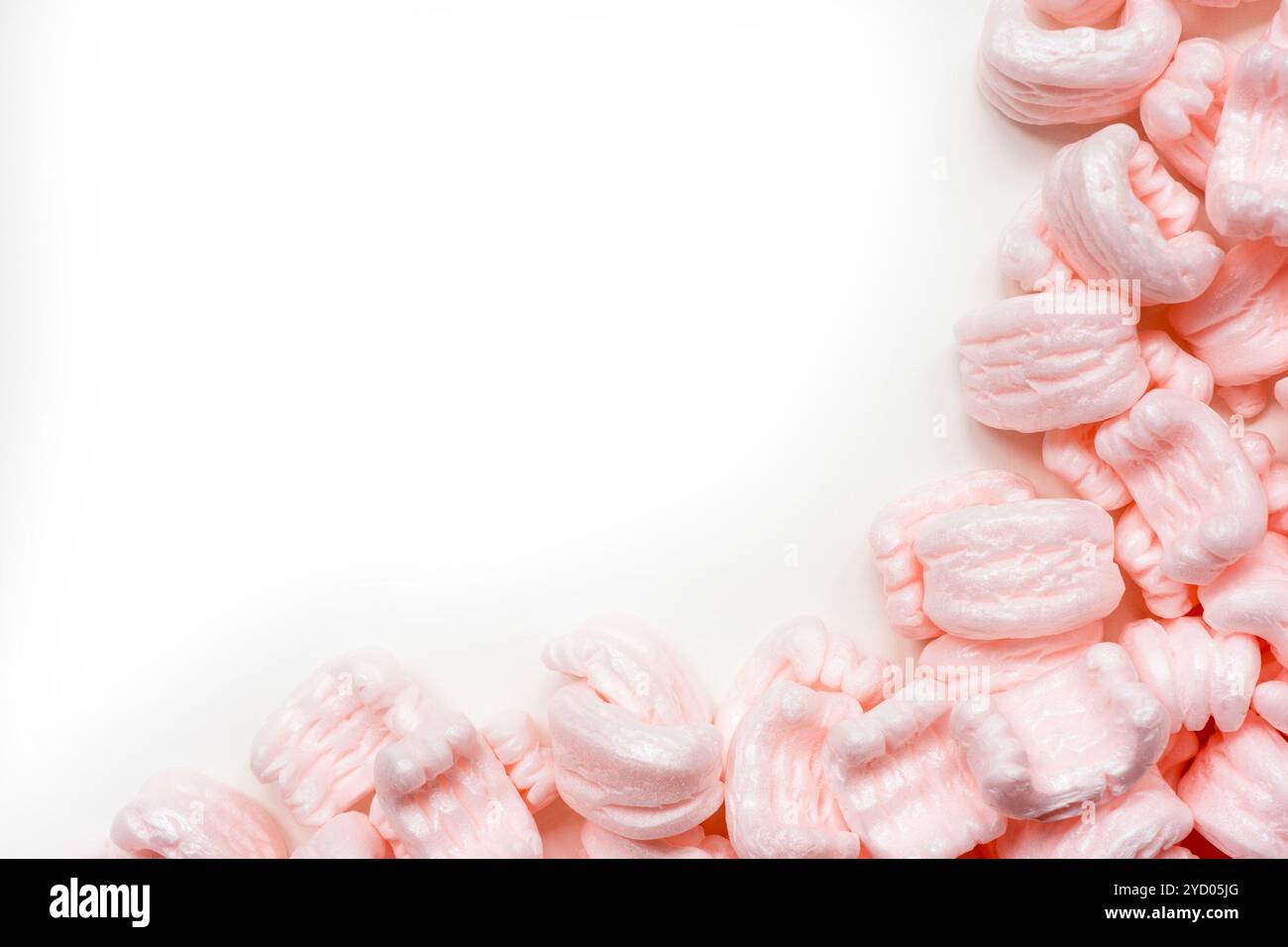 blank white background with many soft polystyrene fill packaging pieces ...