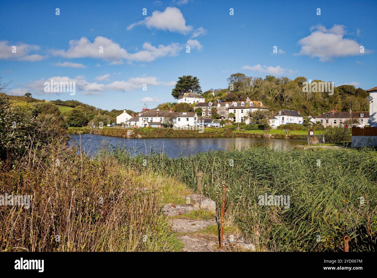 Blue sky over Pentewan Dock, Cornwall Stock Photo - Alamy